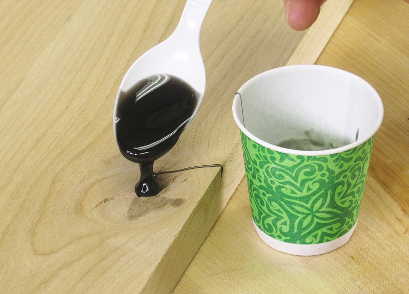 How to Fill Knot Holes and Cracks with Black Epoxy – Woodworkers Source ...